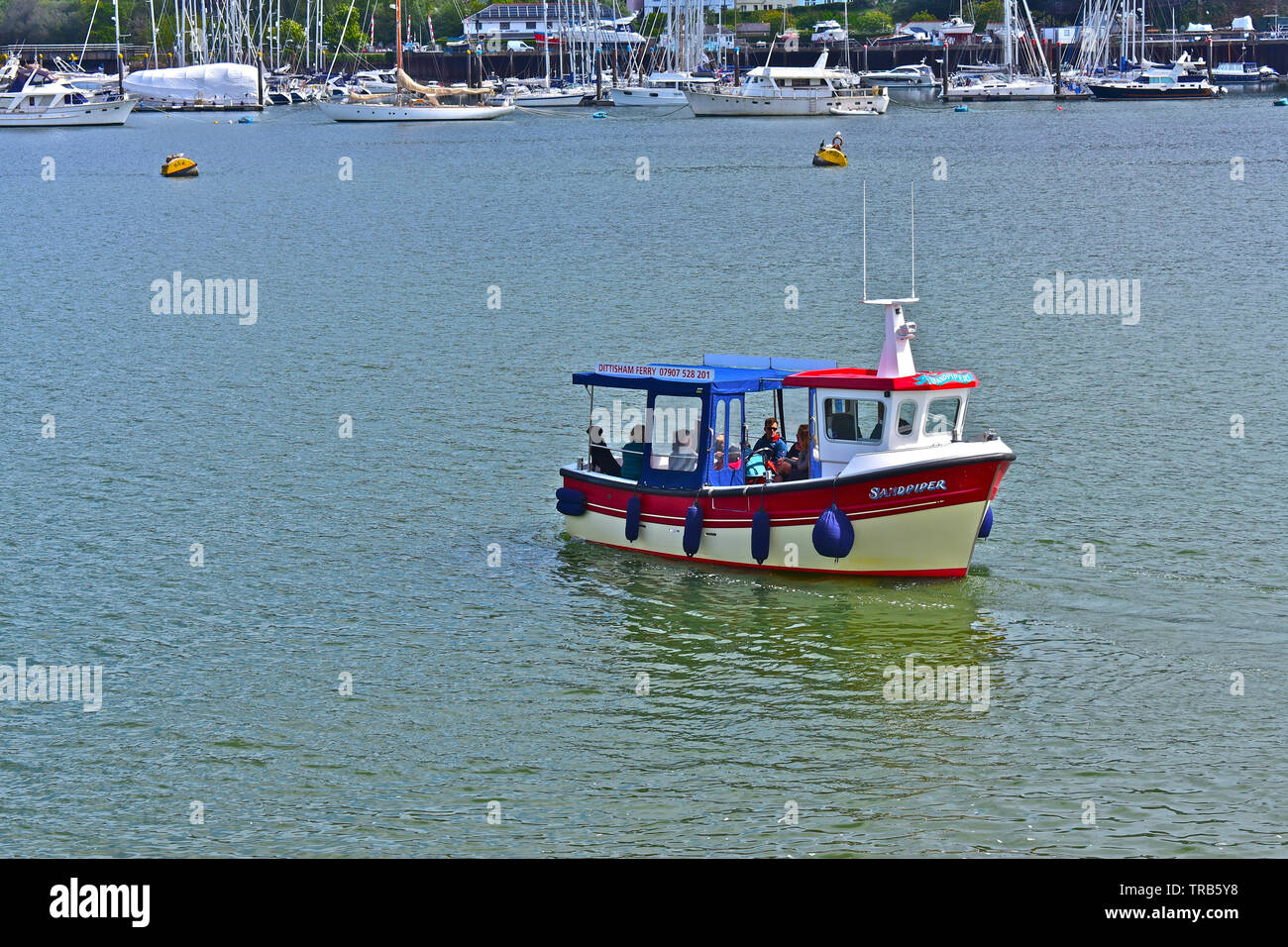 The small ferry boat 'Sandpiper' carries passengers on the pretty river ...