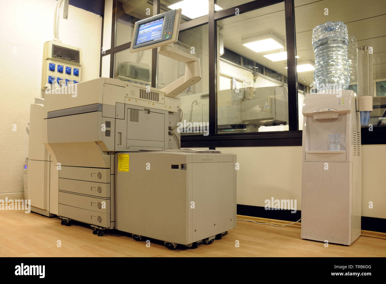 office copy machine and water dispenser Stock Photo - Alamy