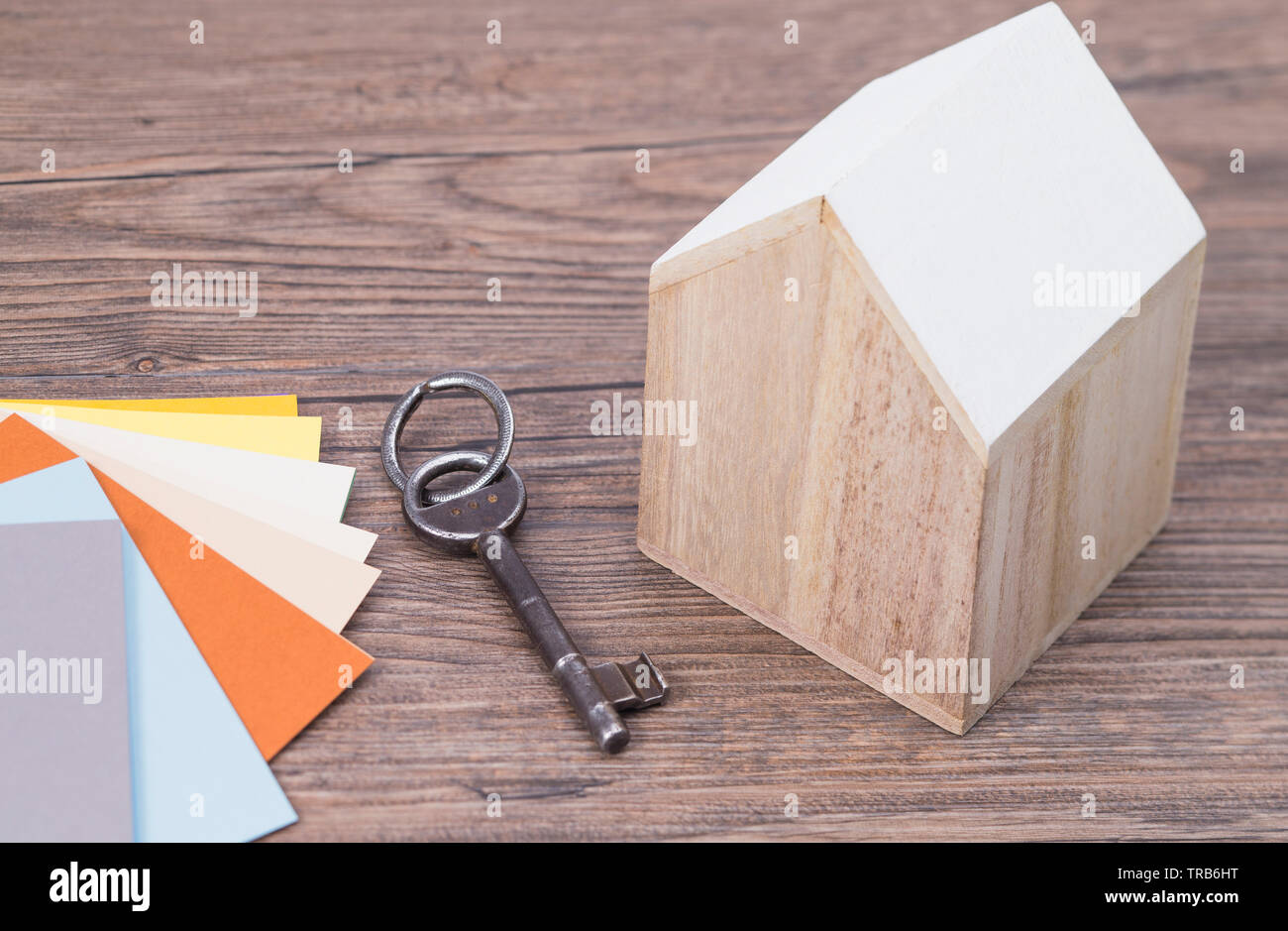 The photo shows a wooden house with color guides and keys Stock Photo ...