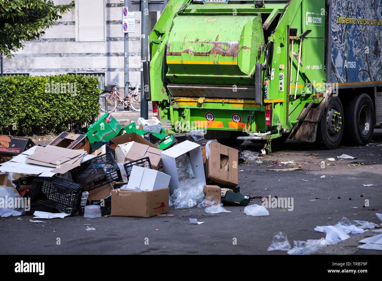 2 JUNE 2018, MILAN, ITALY: Garbage remains on the street at the site of ...