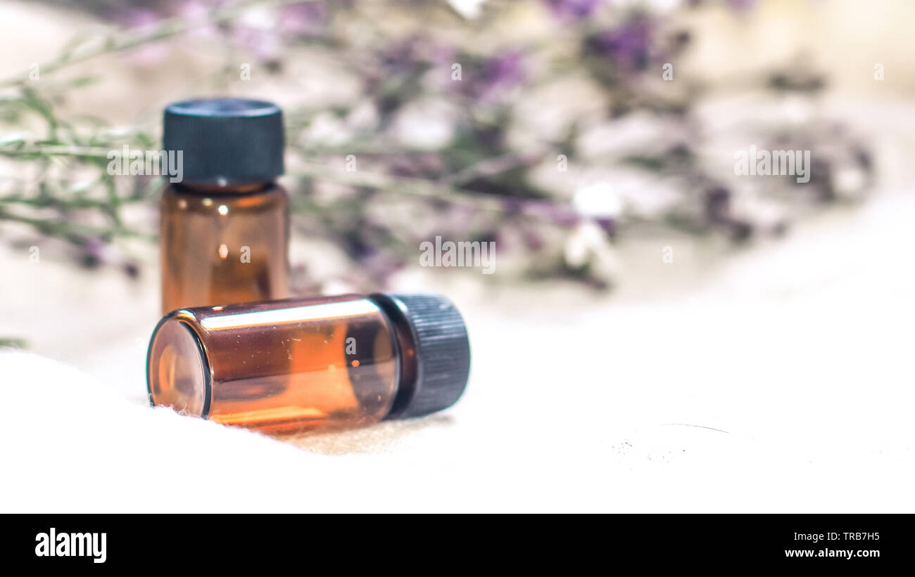 Bottle of essential oil. Herbal medicine or aromatherapy dropper bottle ...