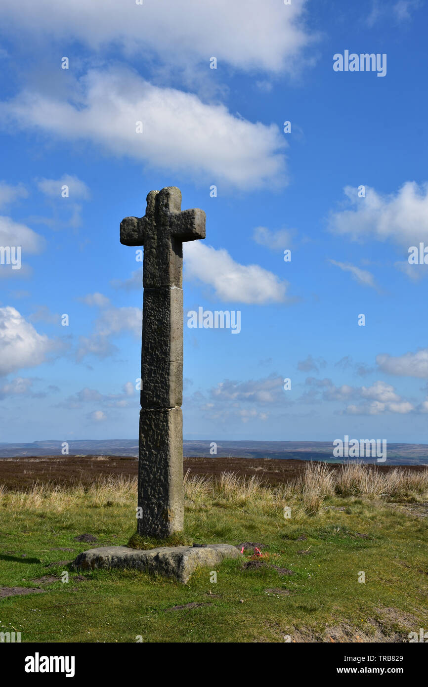 Large memorial stone cross waymarker on the moors in England Stock ...