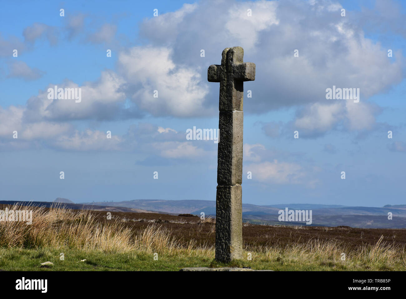 Towering stone memorial cross along the Coast to Coast route in England ...