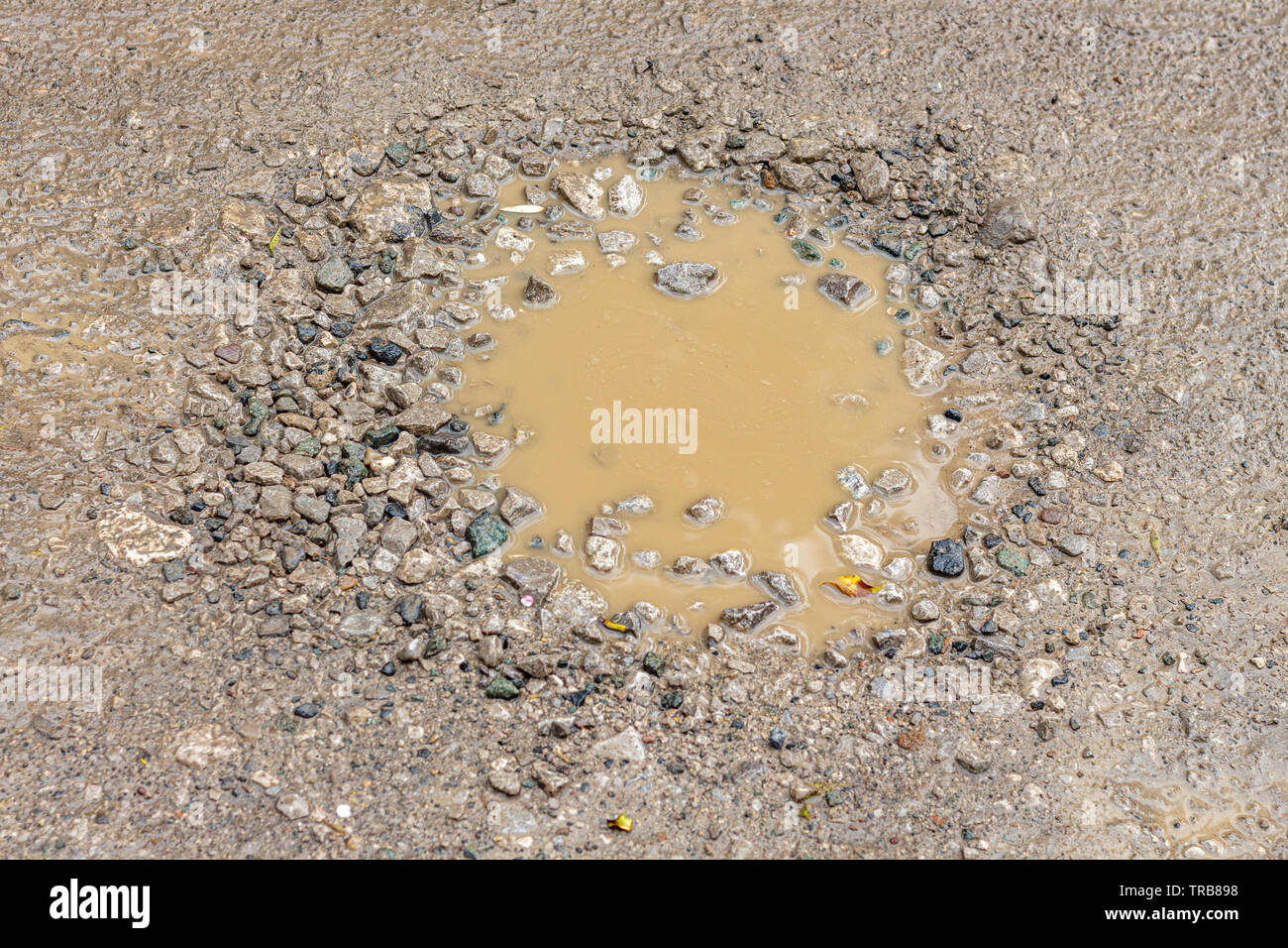 Rainwater pothole hi-res stock photography and images - Alamy