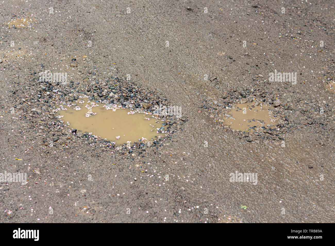 Pothole Filled With Rainwater High Resolution Stock Photography and Images - Alamy