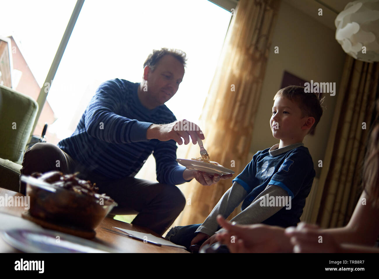 Father son eating spaghetti hi-res stock photography and images - Alamy