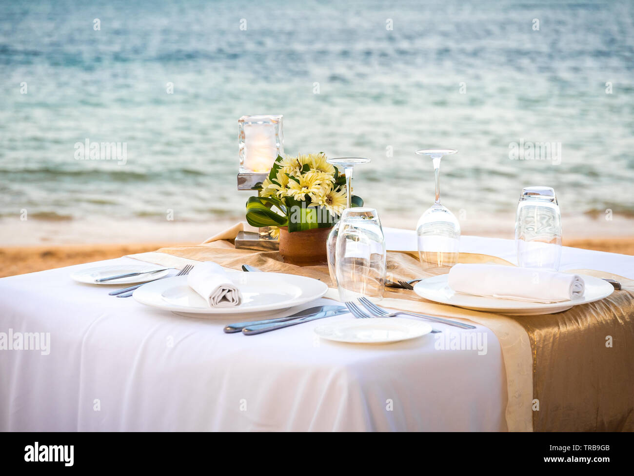Romantic table setting in the evening on Bali island, Indonesia Stock ...
