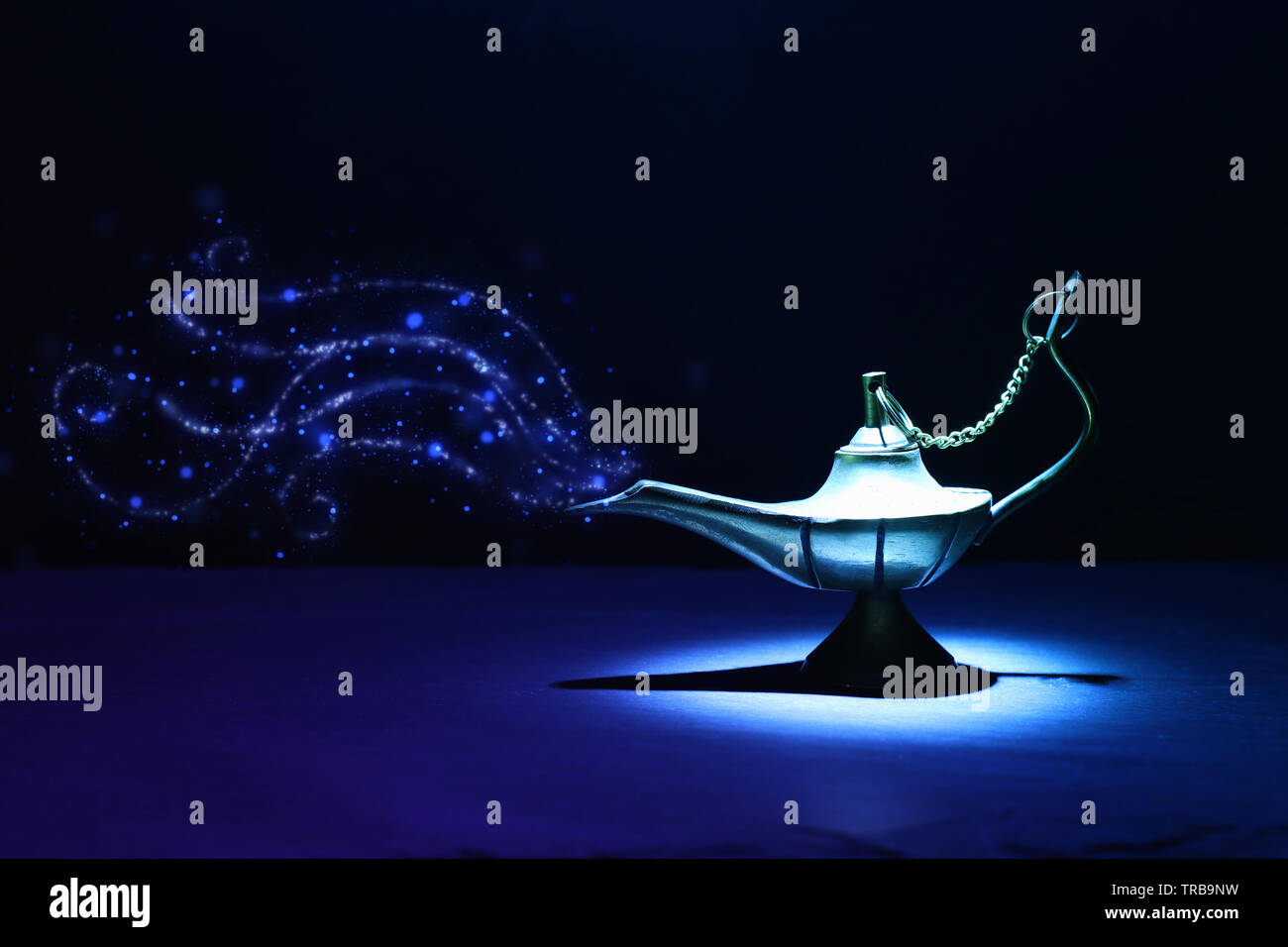 Image of magical mysterious aladdin lamp with glitter smoke. Dark ...