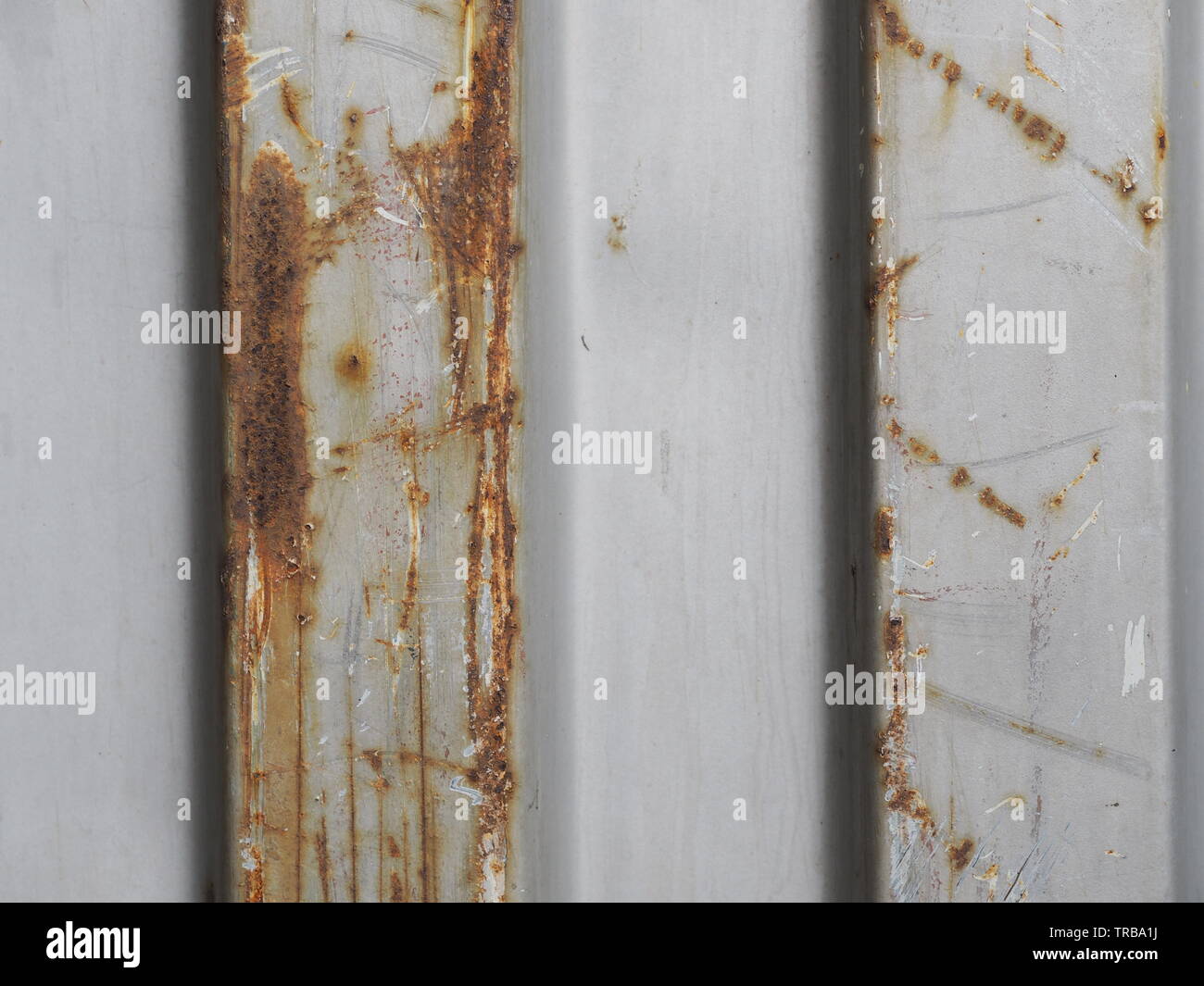 Rust on the iron wall Stock Photo - Alamy
