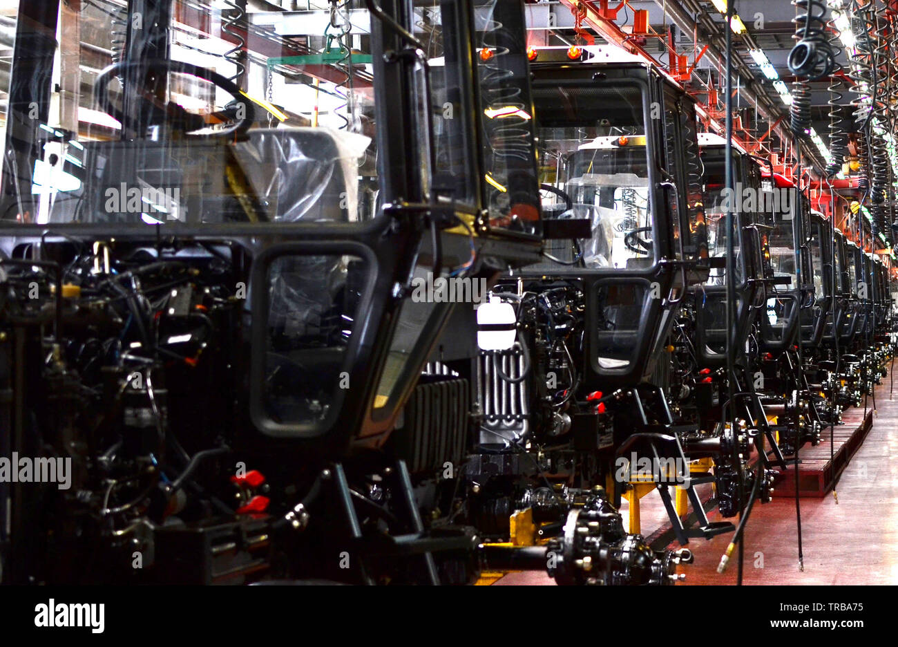 Tractor Manufacture work. Assembly line inside the agricultural ...