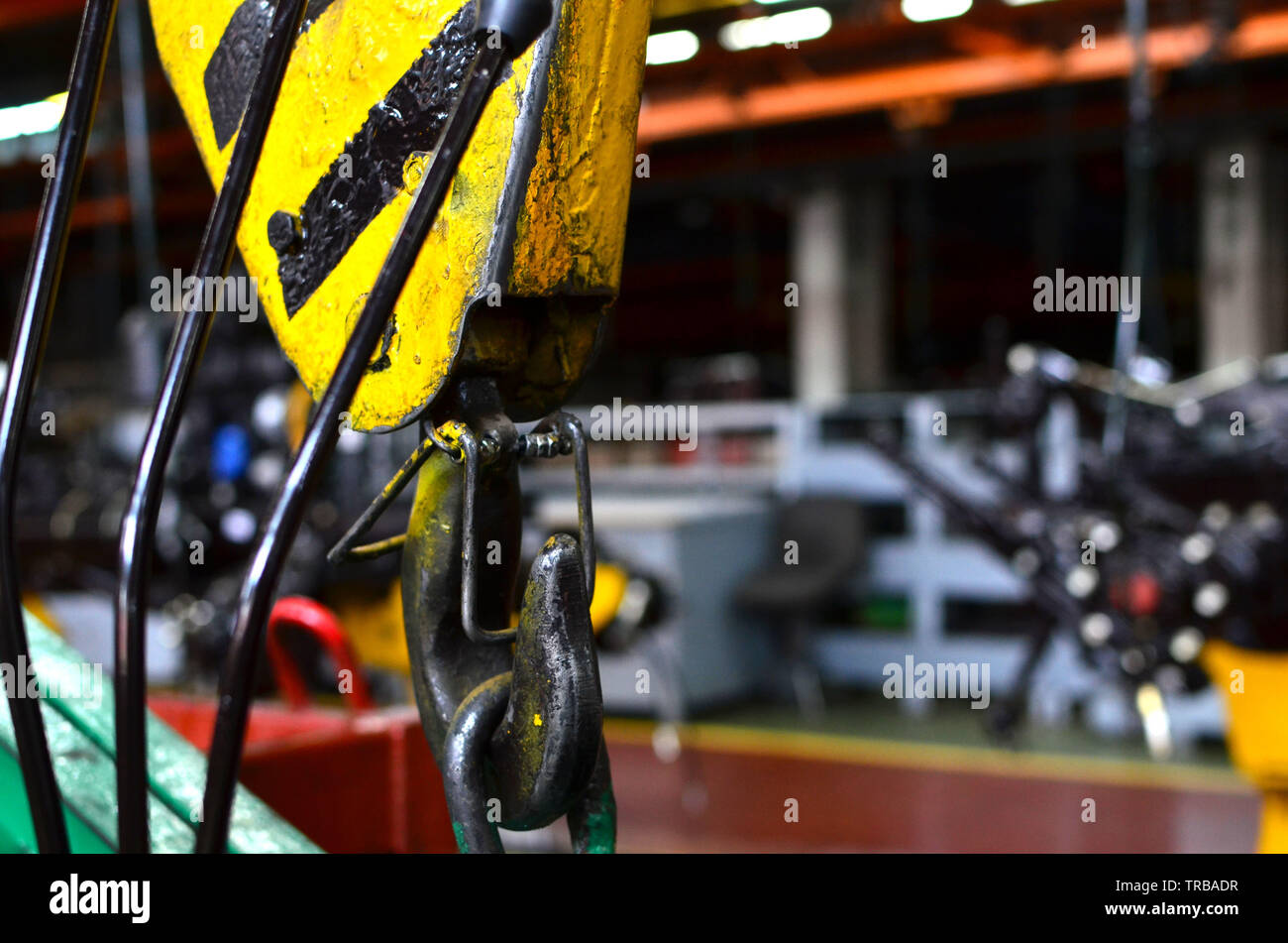 Bridge lifting Crane Hook against the background of the Assembly Line ...