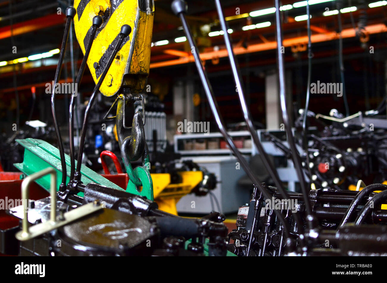 Bridge lifting Crane Hook against the background of the Assembly Line ...