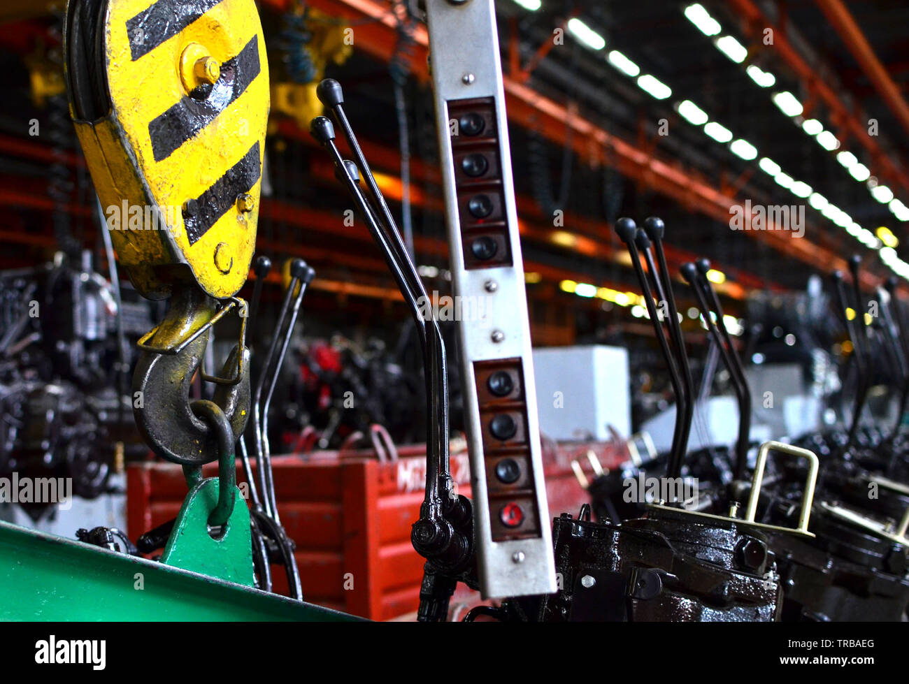 Bridge lifting Crane Hook against the background of the Assembly Line ...