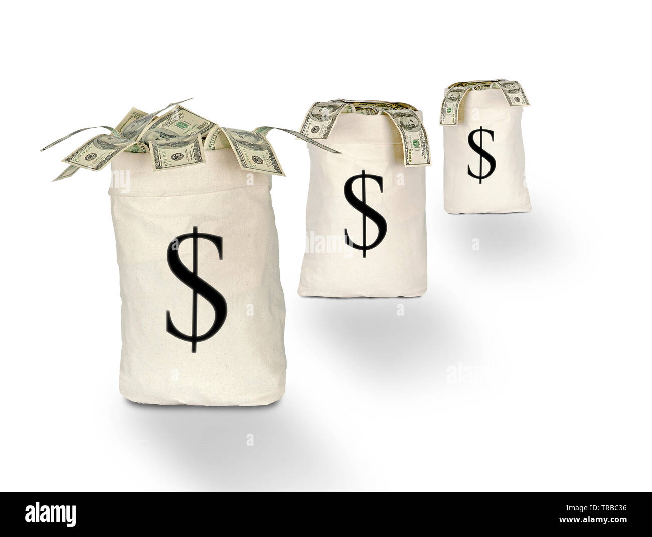 Three bags with dollars Stock Photo - Alamy