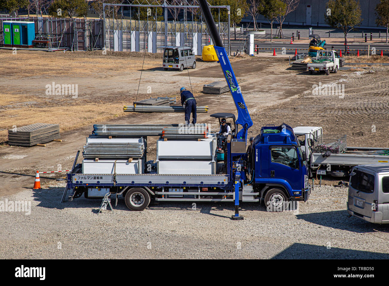 Tokyo, Japan - 23 February 2019 - Construction workers load equipments ...