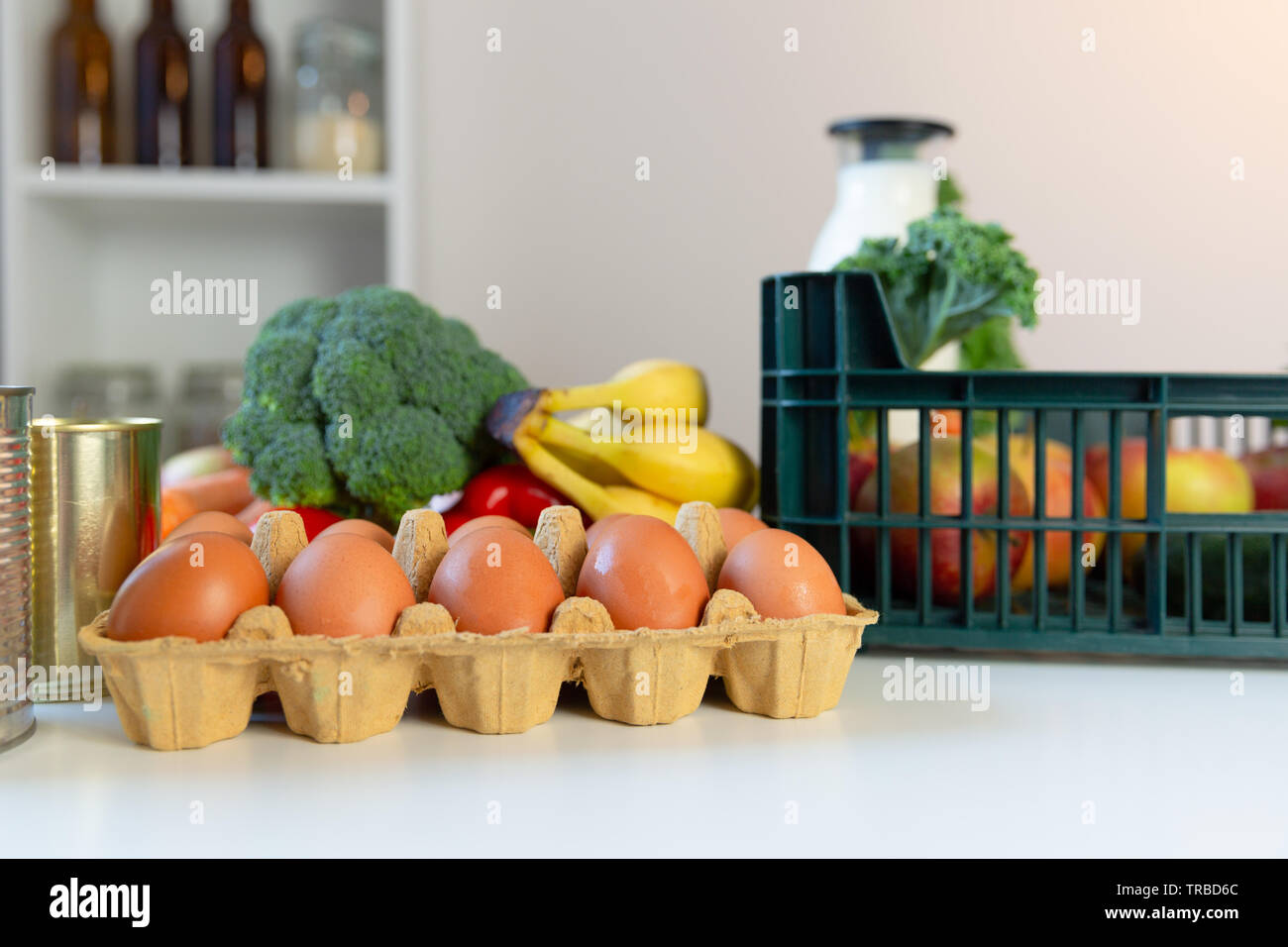Fresh healthy groceries and vegetables from supermarket in green tray ...