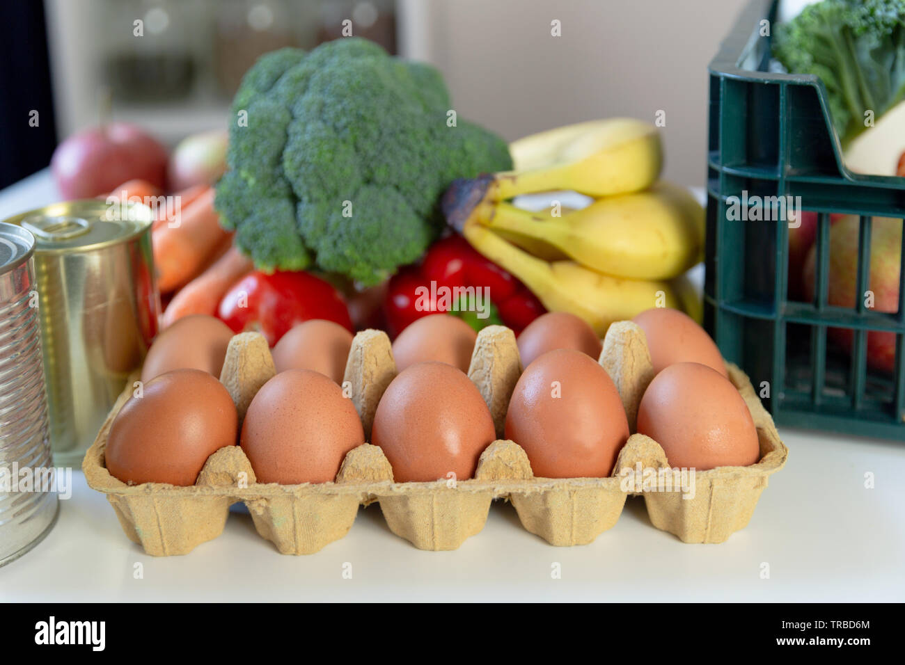 Fresh healthy groceries and vegetables from supermarket in green tray ...