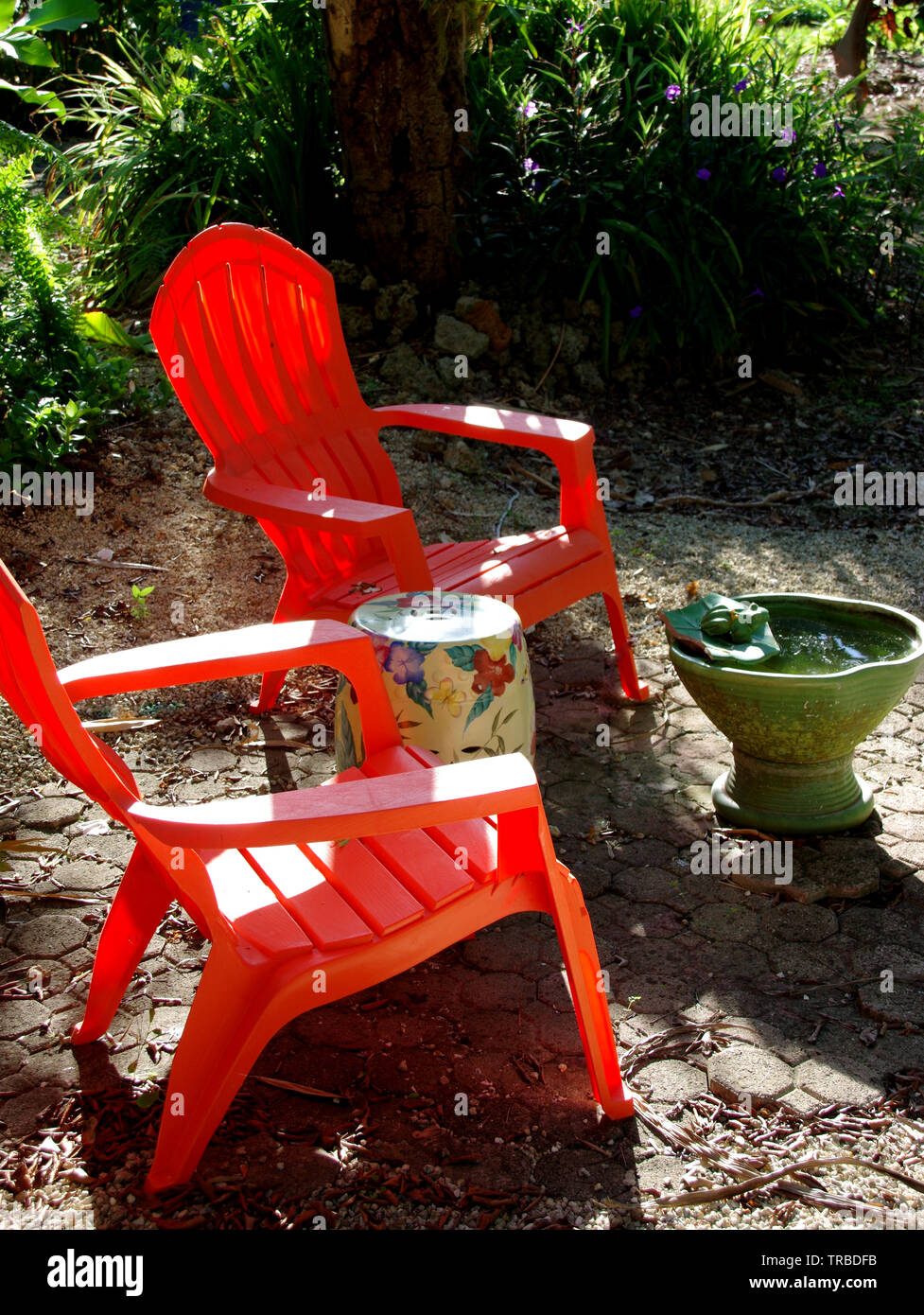 Patio Chairs in Forest Setting Stock Photo - Alamy