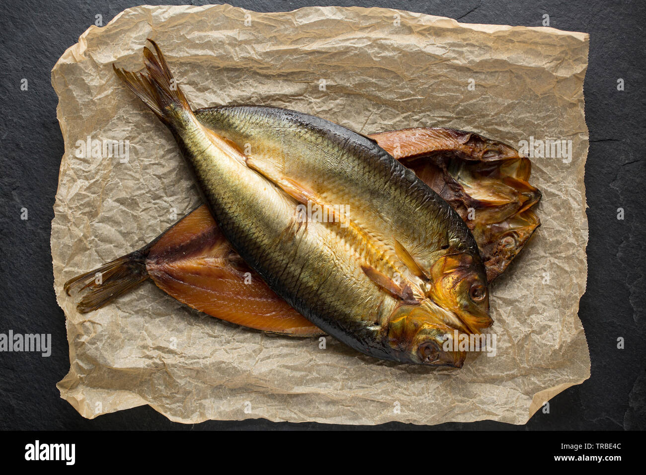 A pair of herrings, Clupea harengus, that have been split and cold ...