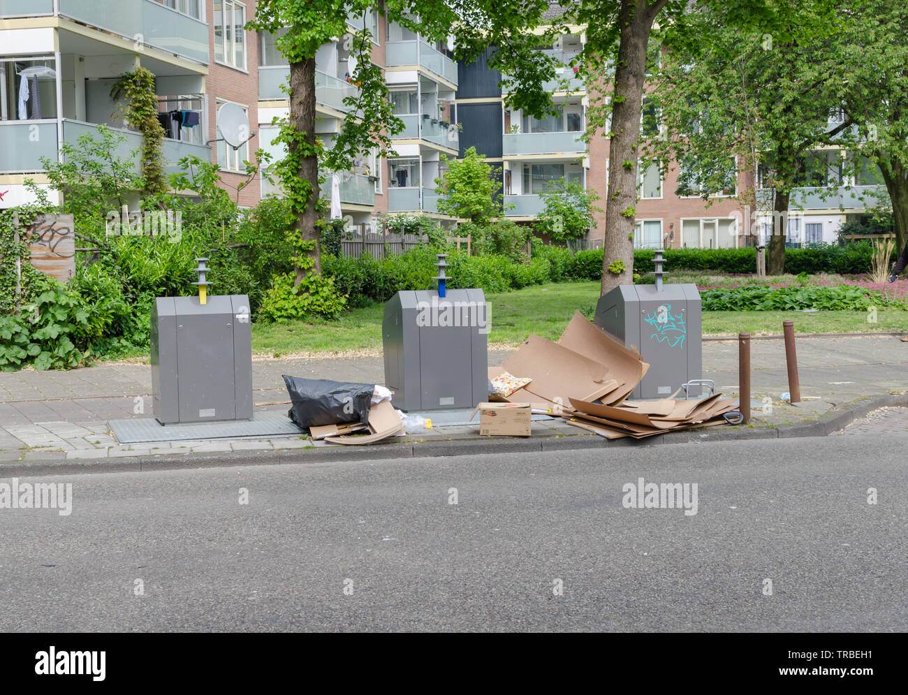 Amsterdam Oost. East side neighbourhoods. View of three garbage ...