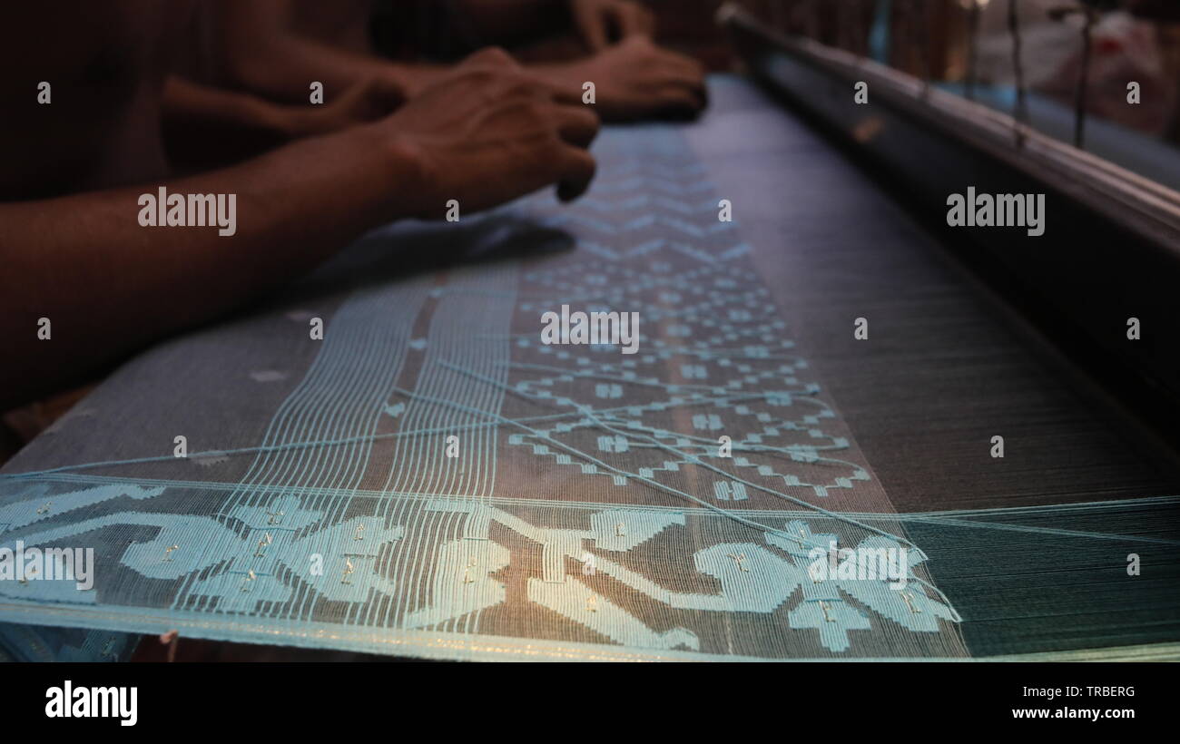 Jamdani is a fine muslin textile of Bengal, produced for centuries in South Rupshi of ...