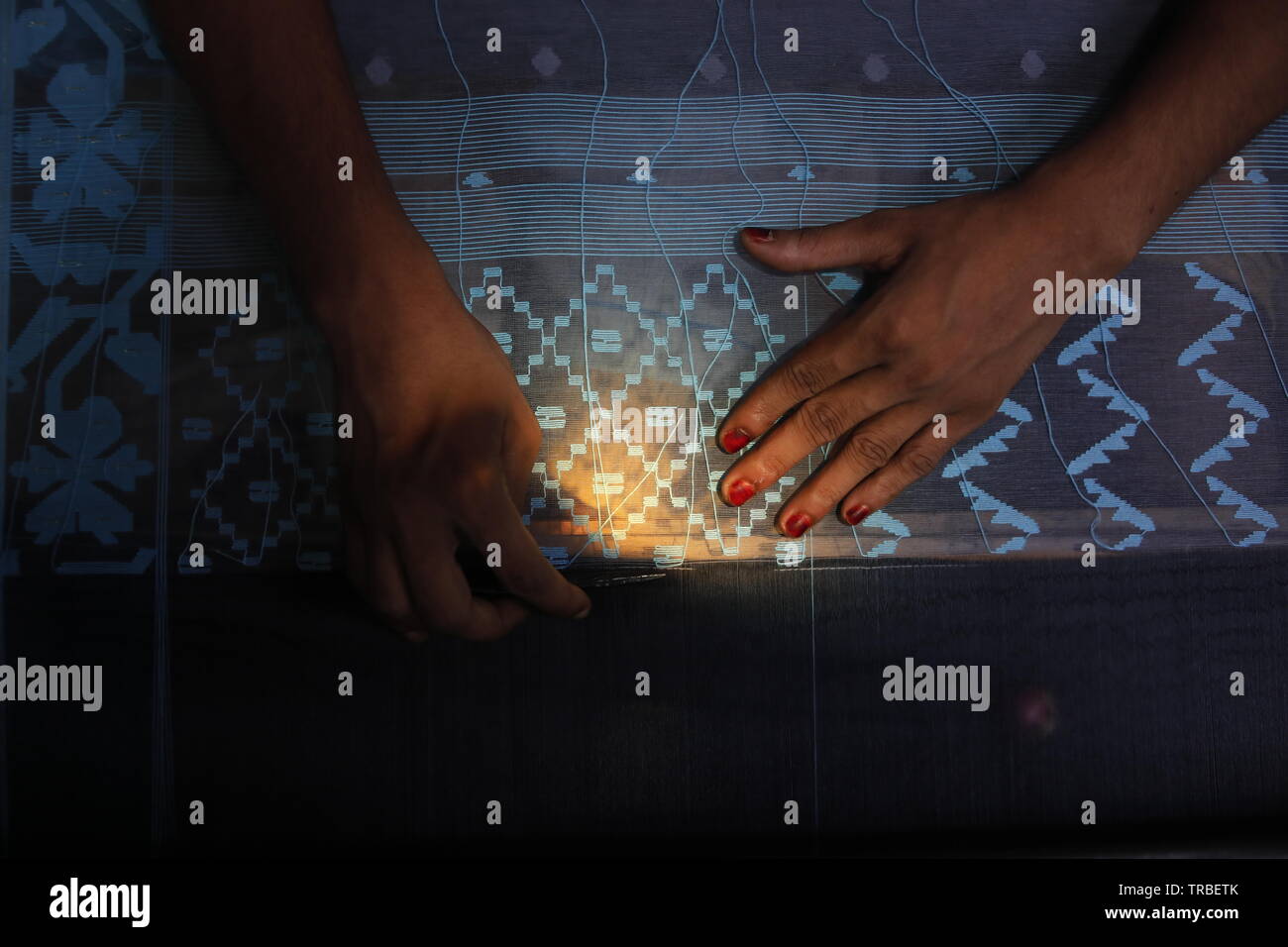 Jamdani is a fine muslin textile of Bengal, produced for centuries in South Rupshi of ...