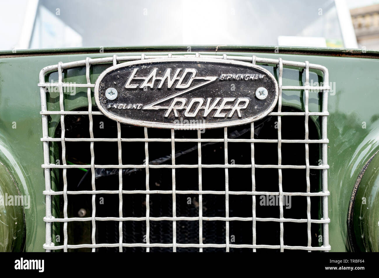 Land Rover cars' classic badge marque mascot Stock Photo - Alamy