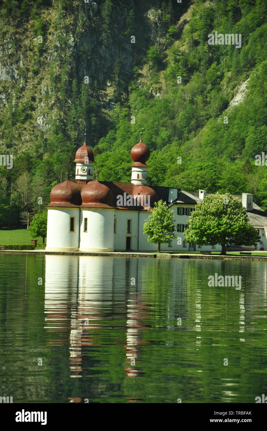 A church by the lake and its reflection in the water Stock Photo - Alamy