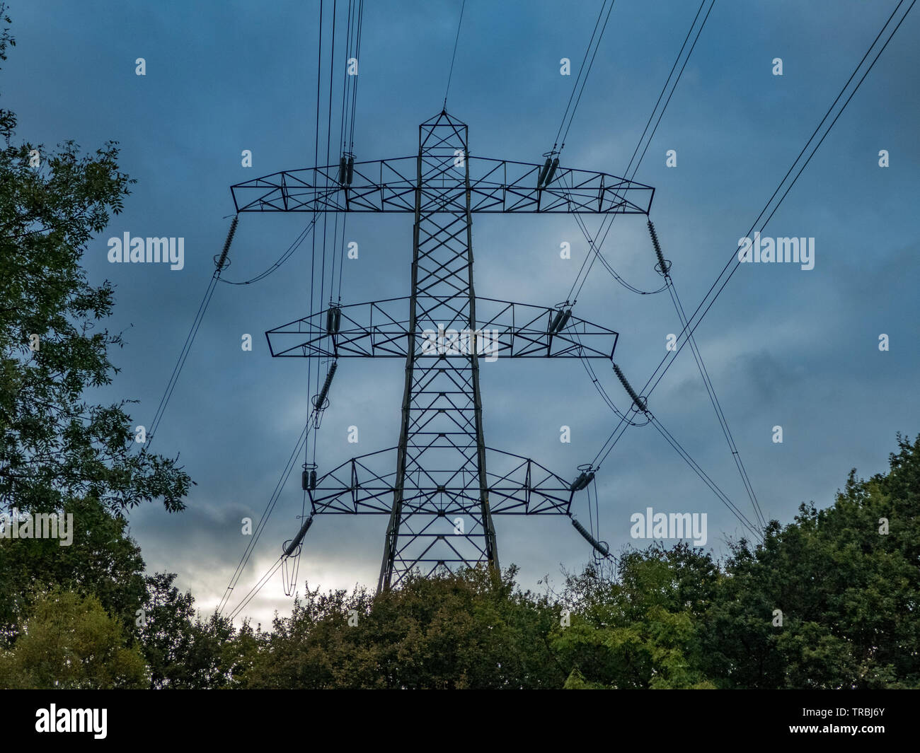 Low angle view of electricity pylon, near the river Goyt, Woodbank Park ...