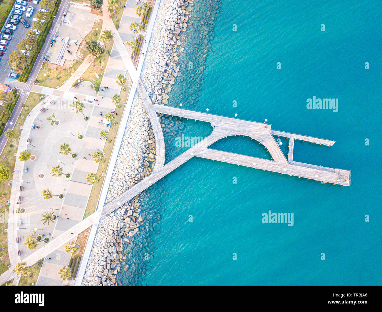 Aerial top down view of Limassol promenade and pedestrian sea bridge ...