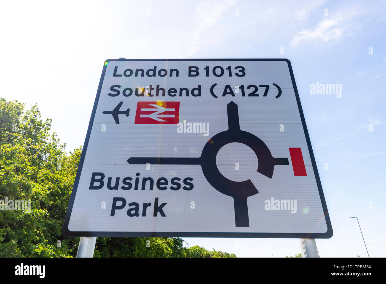 Road sign near London Southend Airport, Essex, UK. Roundabout with ...