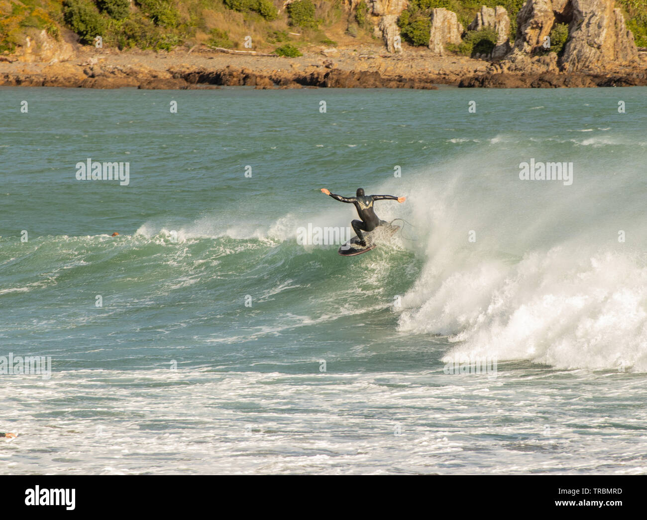 Turning on top of the wave Stock Photo - Alamy