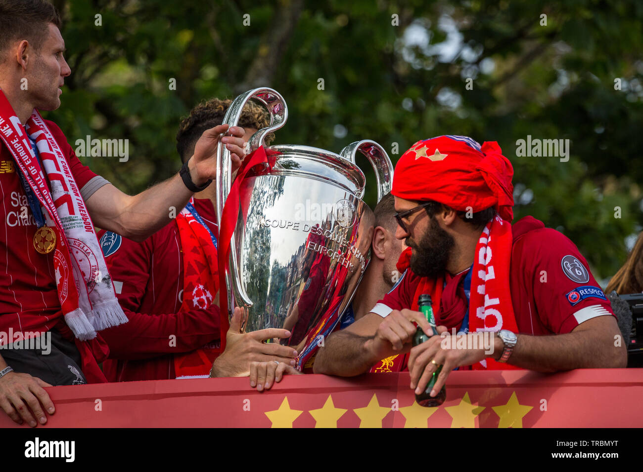 The players and management of Liverpool Football Club seen on an open ...
