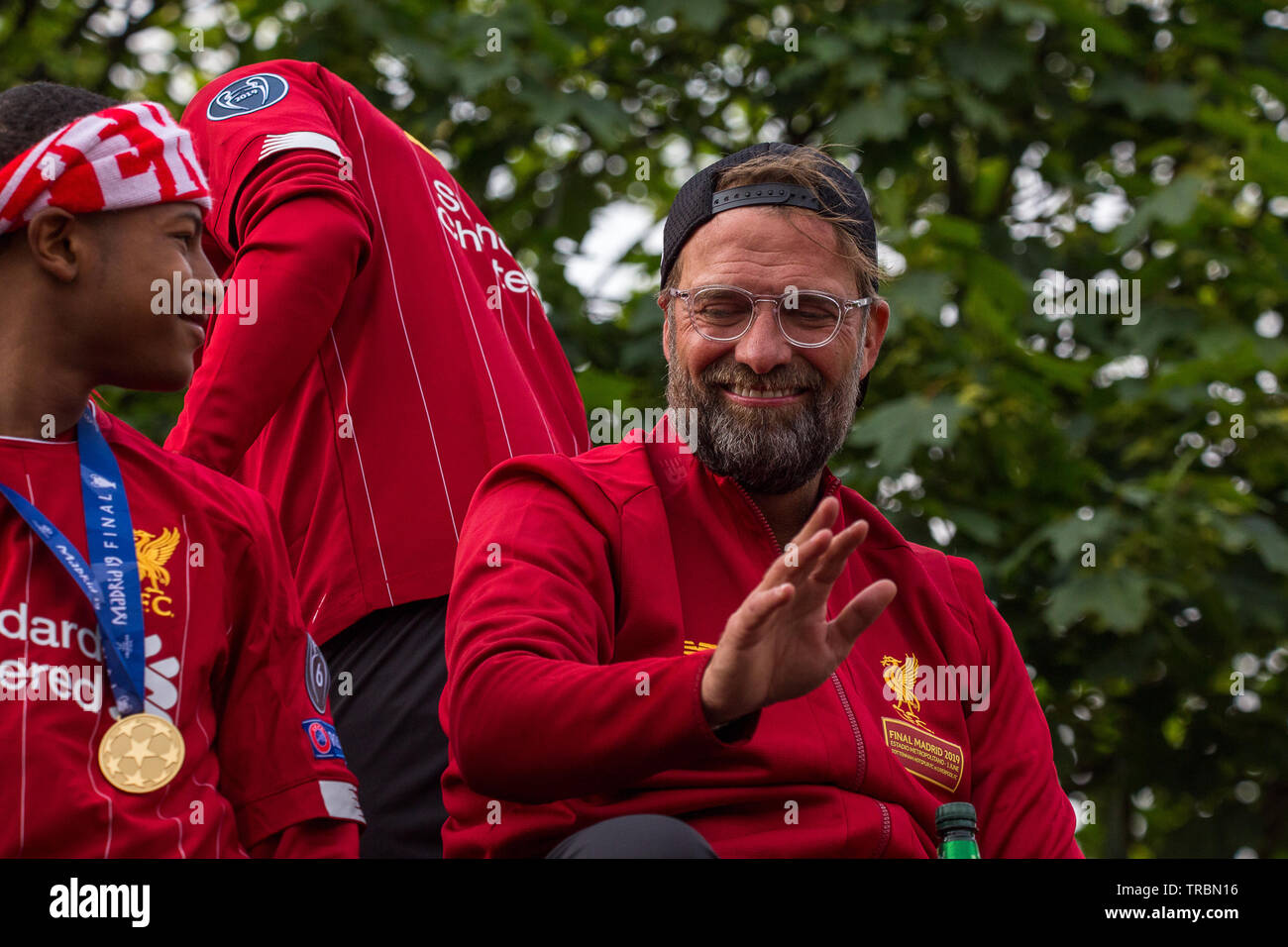 The players and management of Liverpool Football Club seen on an open ...