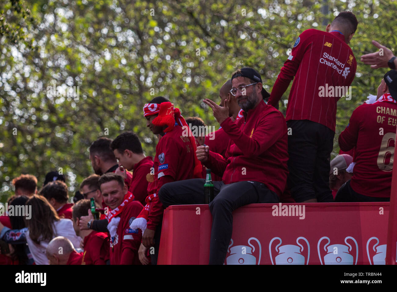 The players and management of Liverpool Football Club seen on an open ...
