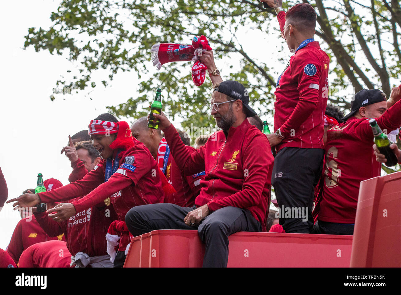 The players and management of Liverpool Football Club seen on an open ...