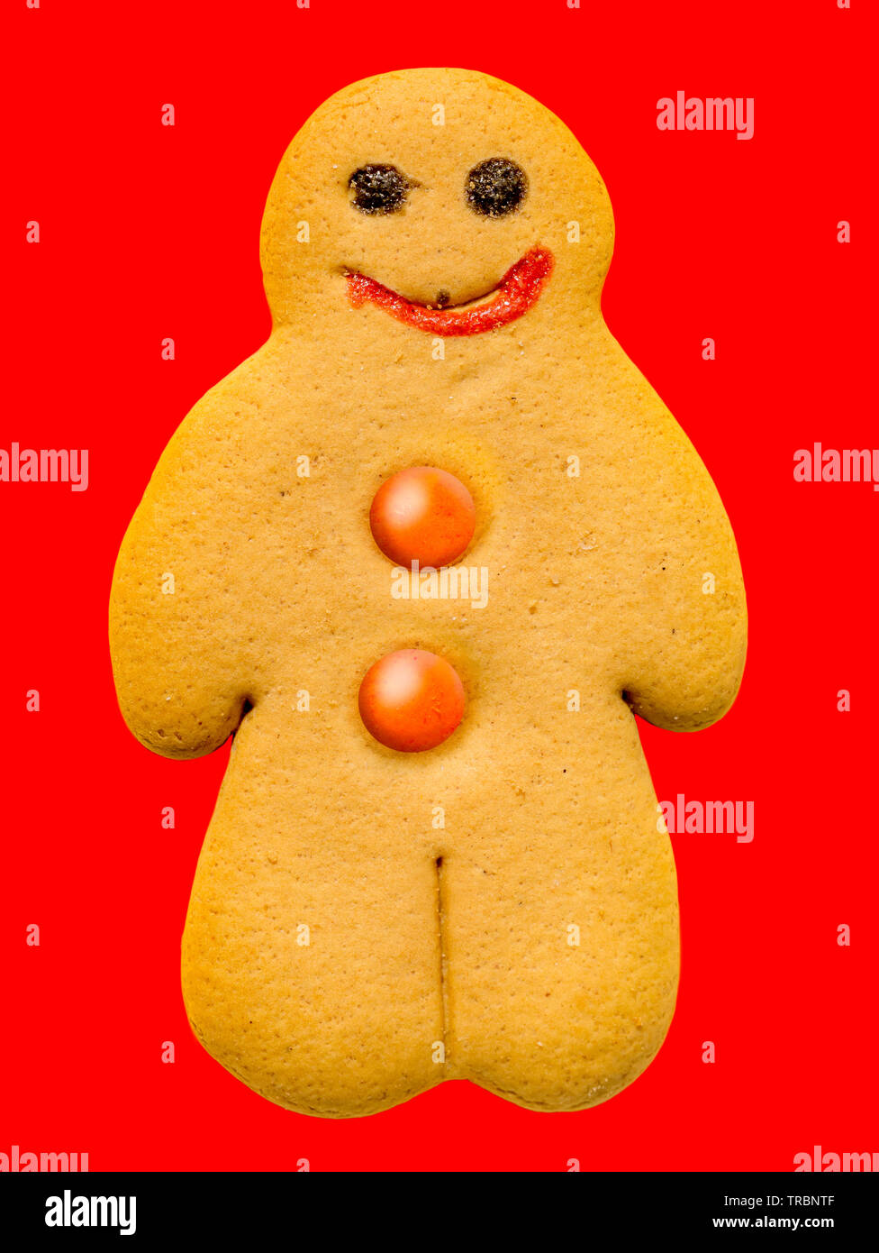 Gingerbread Man on Red background Stock Photo - Alamy