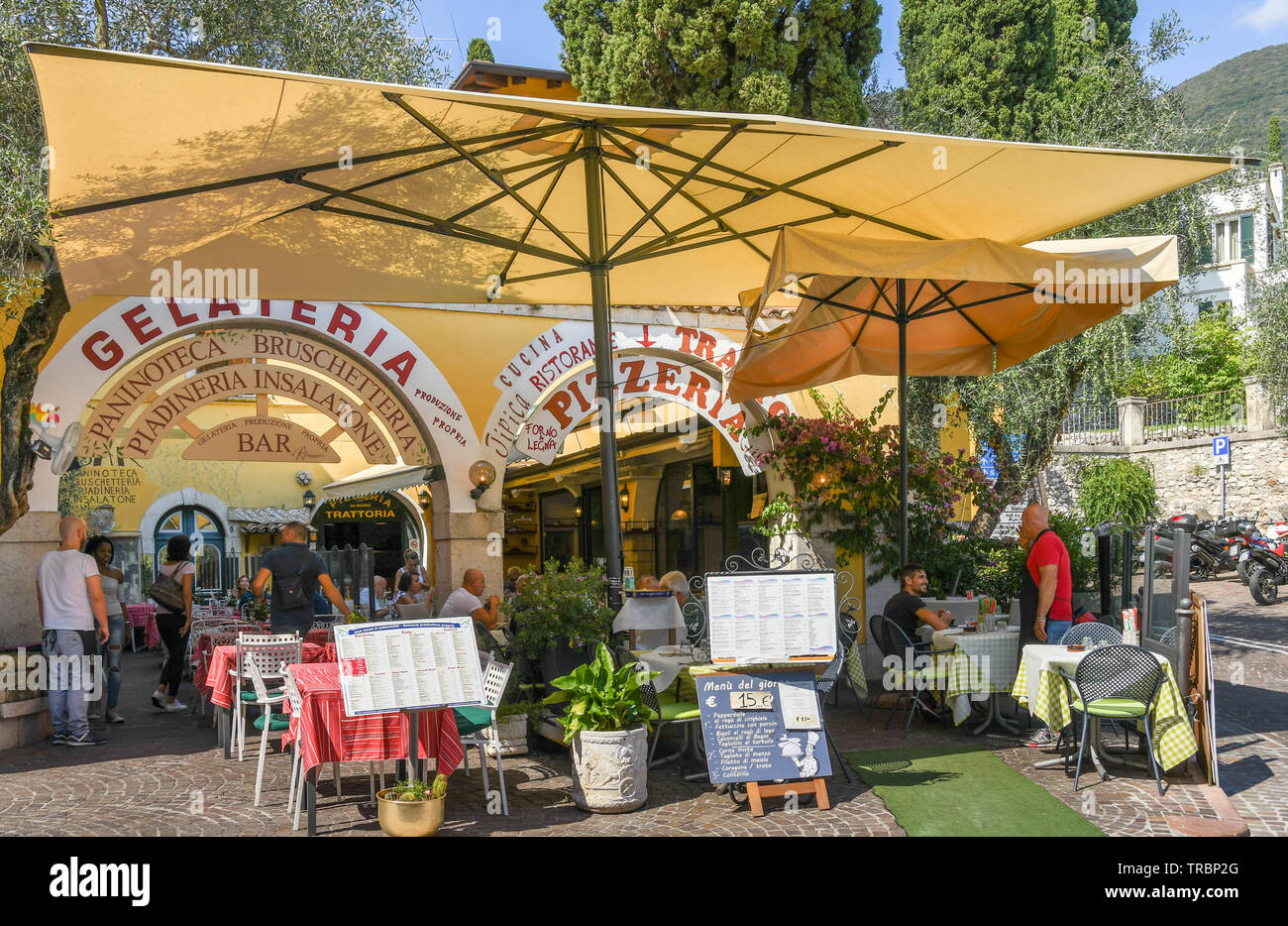 GARDONE RIVIERA, LAKE GARDA, ITALY - SEPTEMBER 2018: Front of a bar and ...