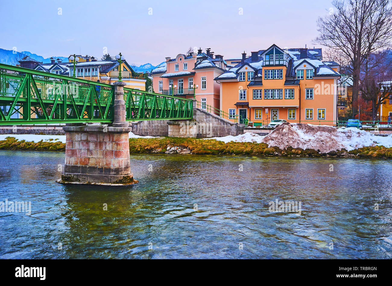 The old scenic mansions neighbor with the green metal bridge across the ...