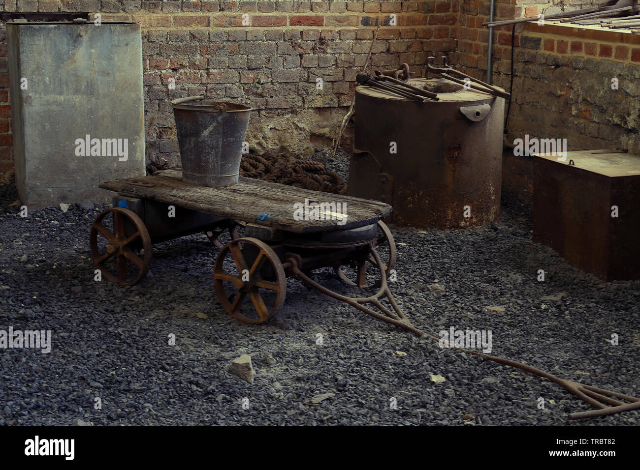 Wooden wheel barrow hi-res stock photography and images - Alamy