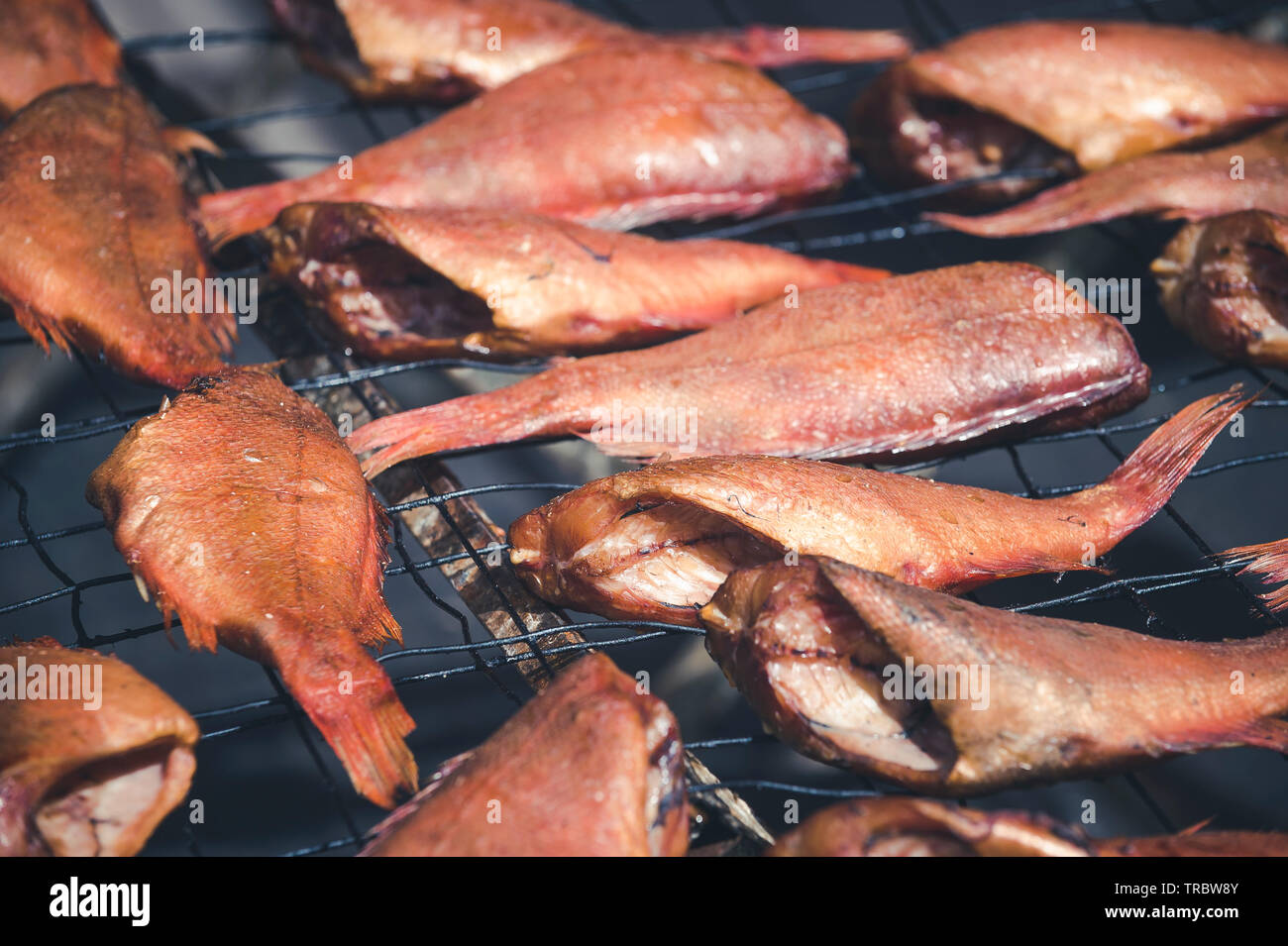 Dried fish,Stack of kipper Stock Photo - Alamy