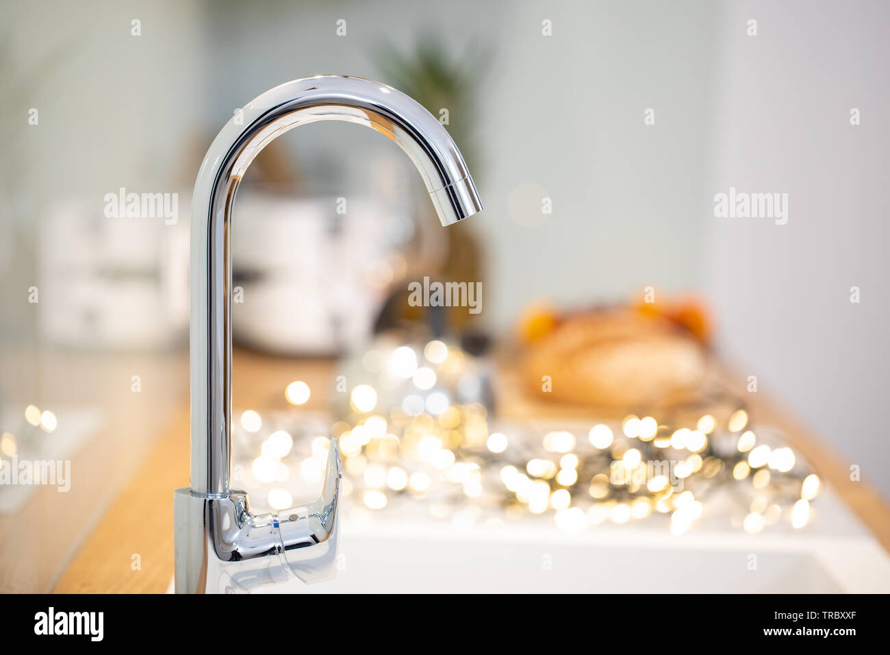 Modern tap, faucet - kitchen interior design Stock Photo - Alamy