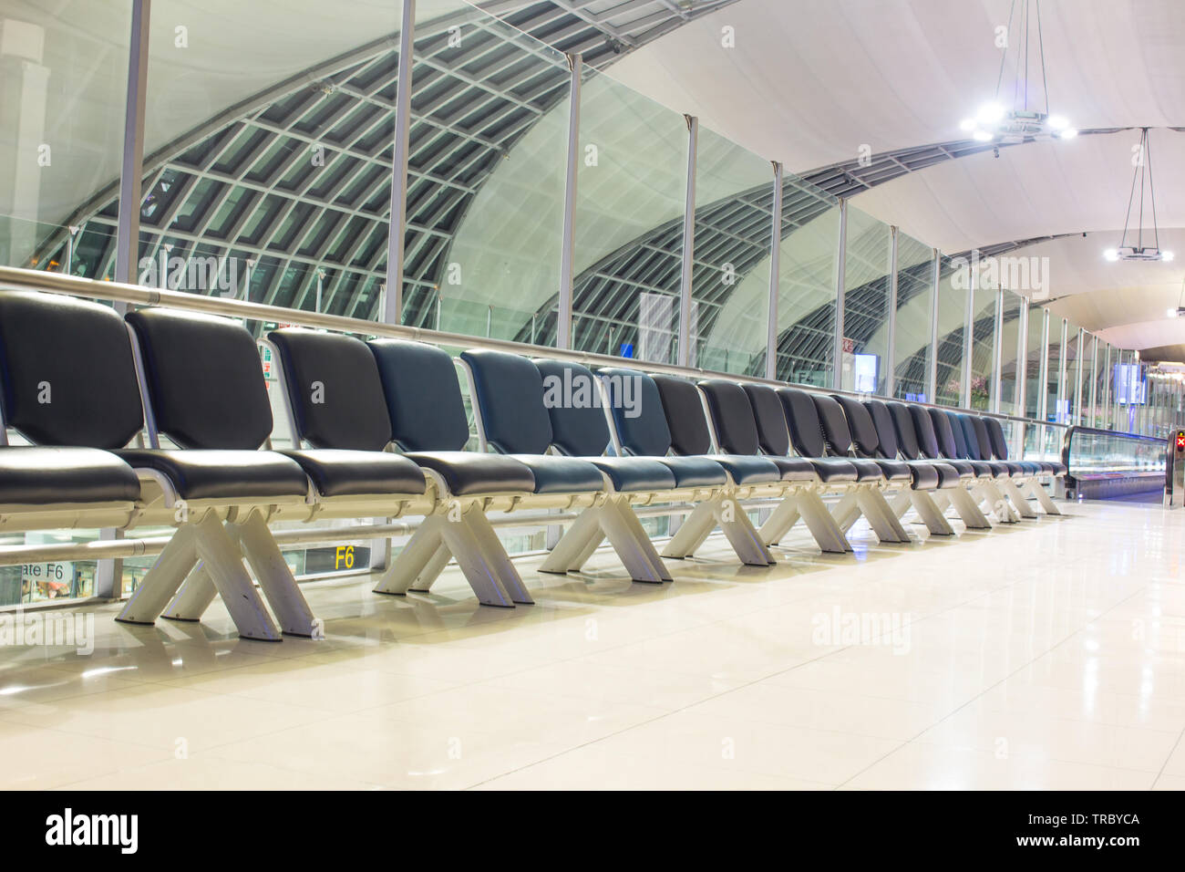 The empty airport terminal waiting area with chairs Stock Photo - Alamy