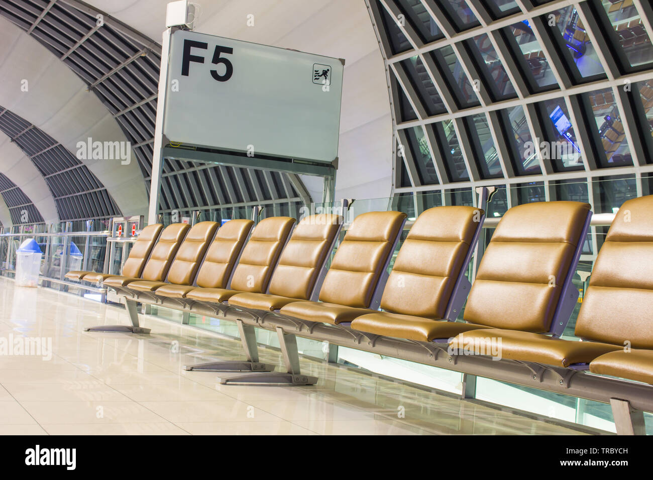 The empty airport terminal waiting area with chairs Stock Photo - Alamy