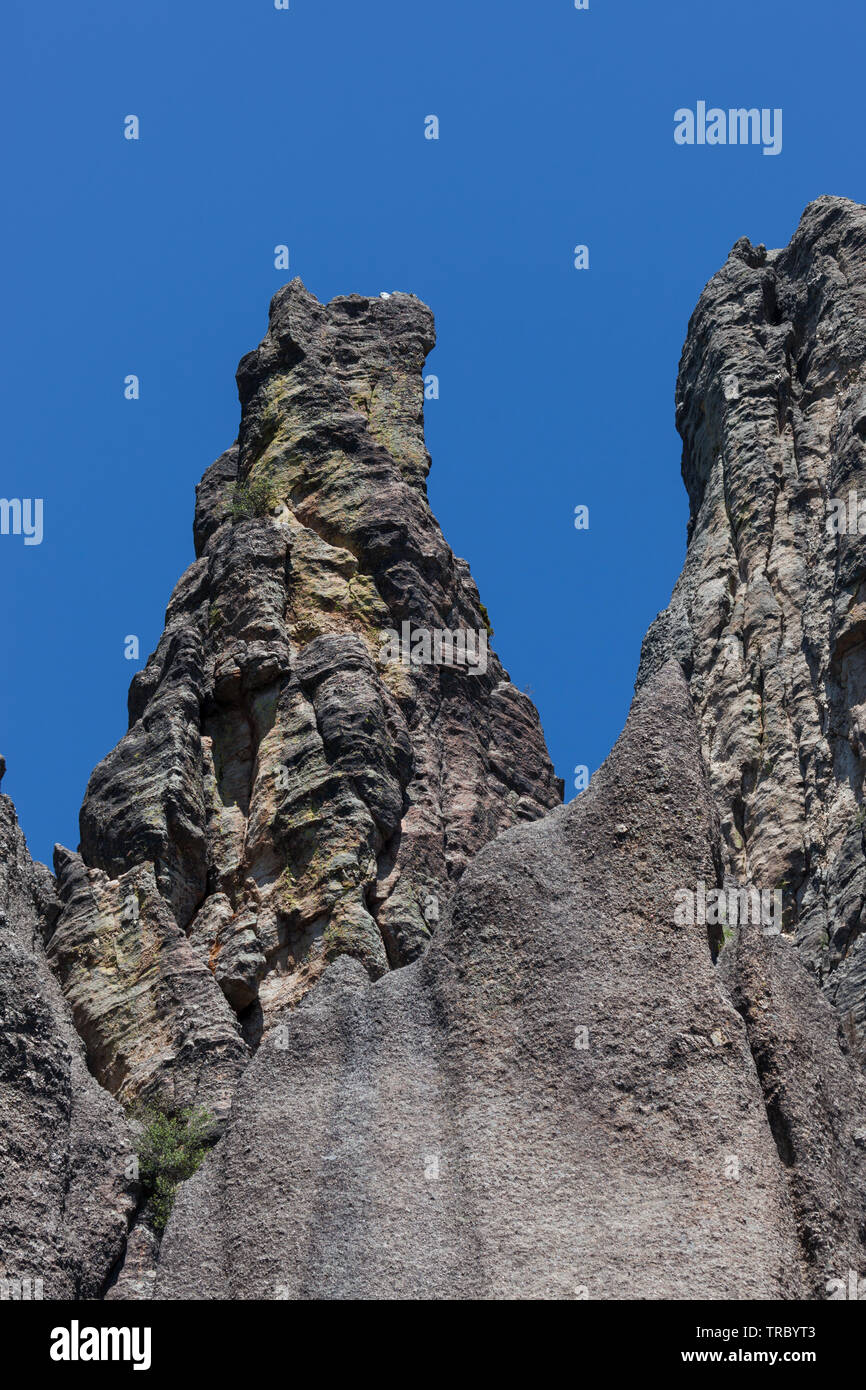 Enormous rock formations against a brilliant blue sky in the Cathedral ...