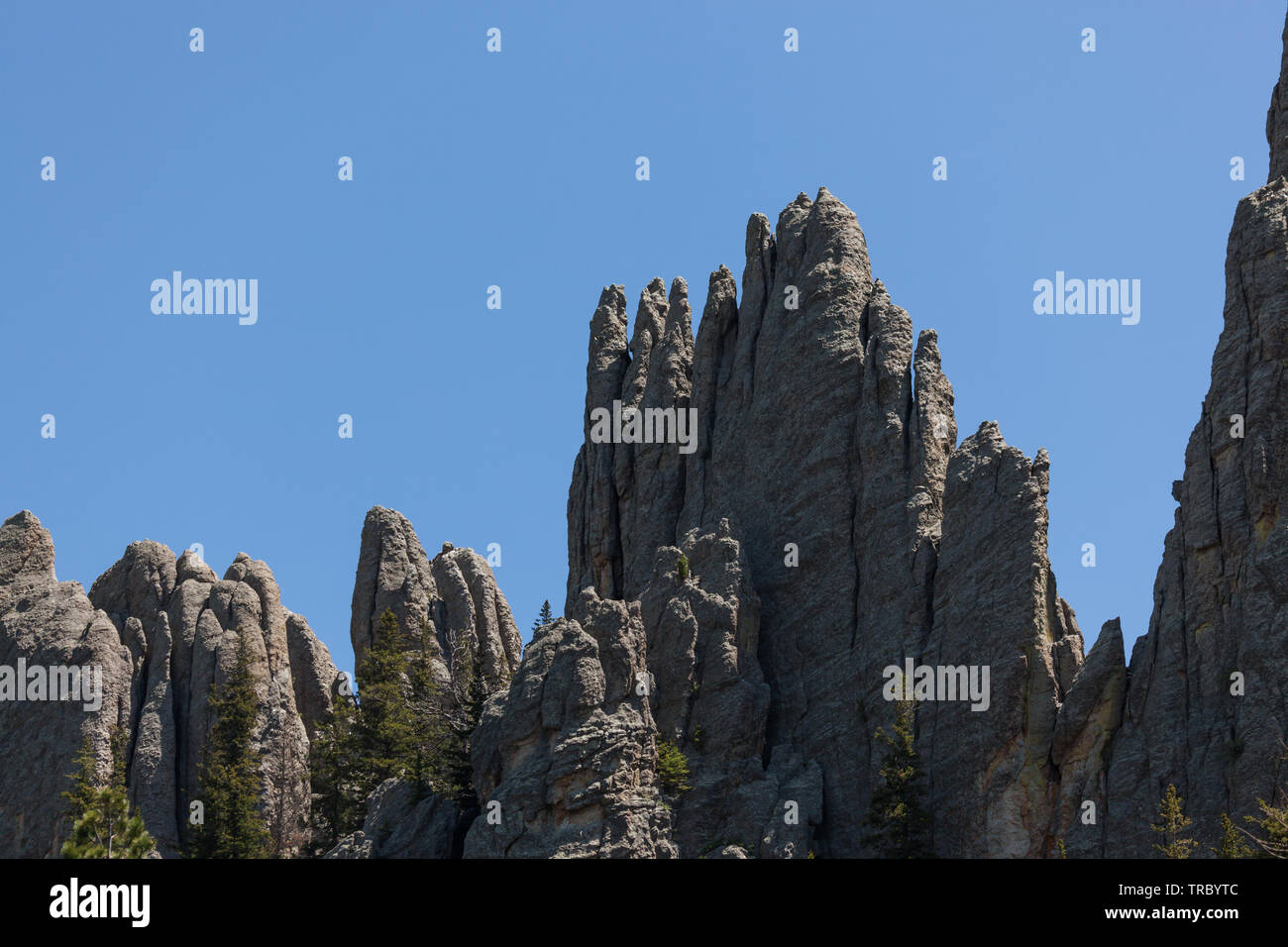 Enormous rock formations against a brilliant blue sky in the Cathedral ...