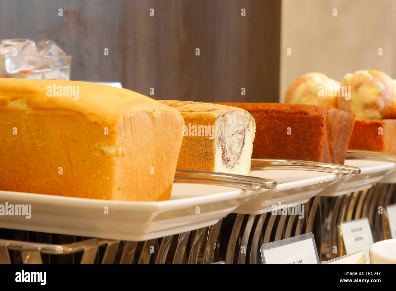 many kinds of cake on buffet line for breakfast Stock Photo - Alamy