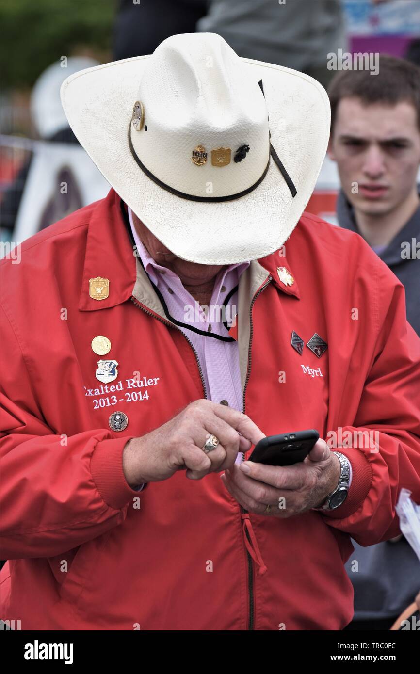 Cowboy with phone hi-res stock photography and images - Alamy