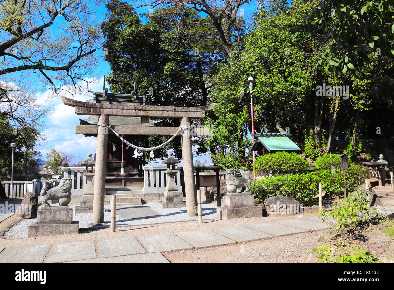 Medieval stone Torii gate in shinto temple in Bikan district, Kurashiki ...