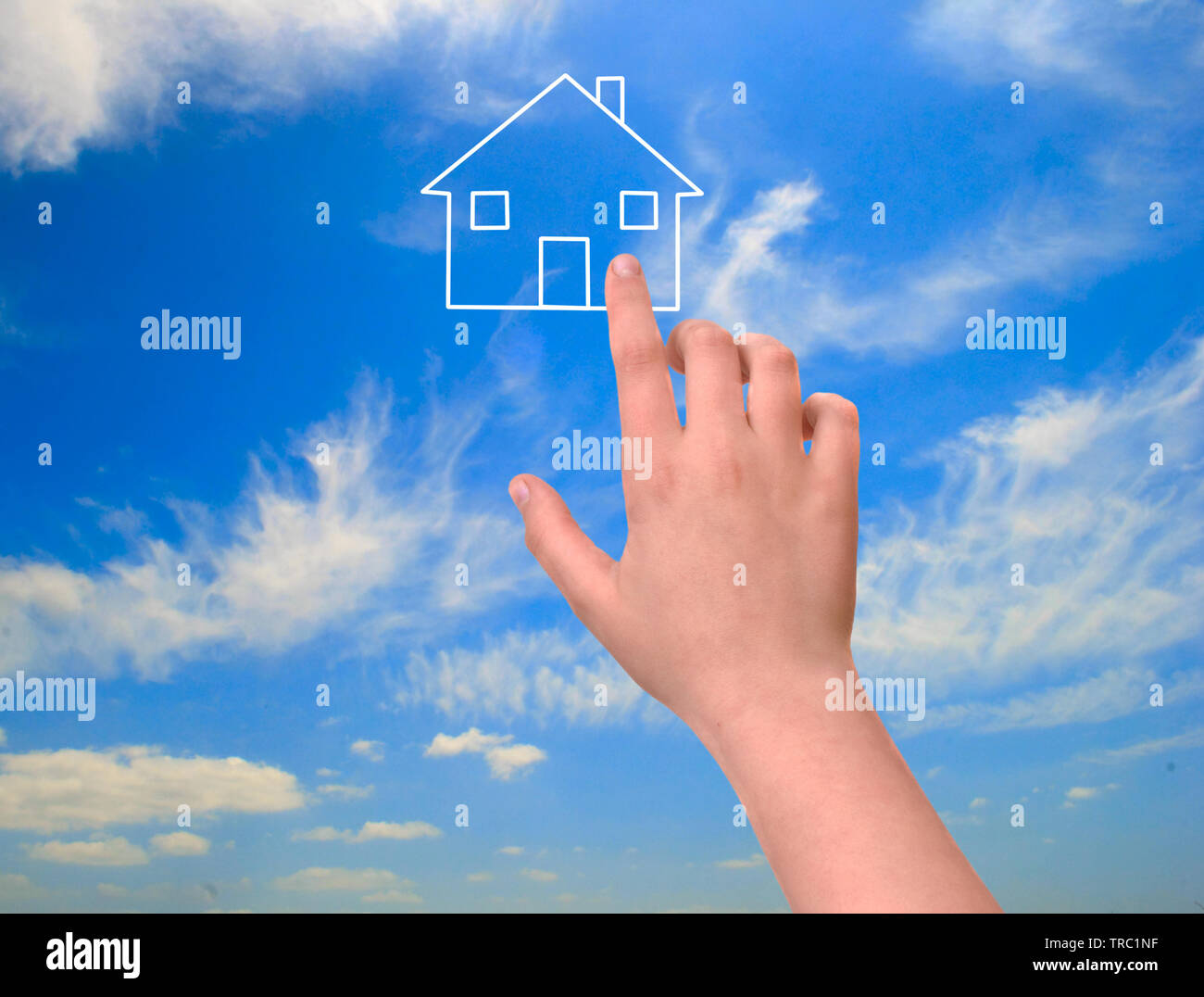 Girl pointing to dream house Stock Photo - Alamy